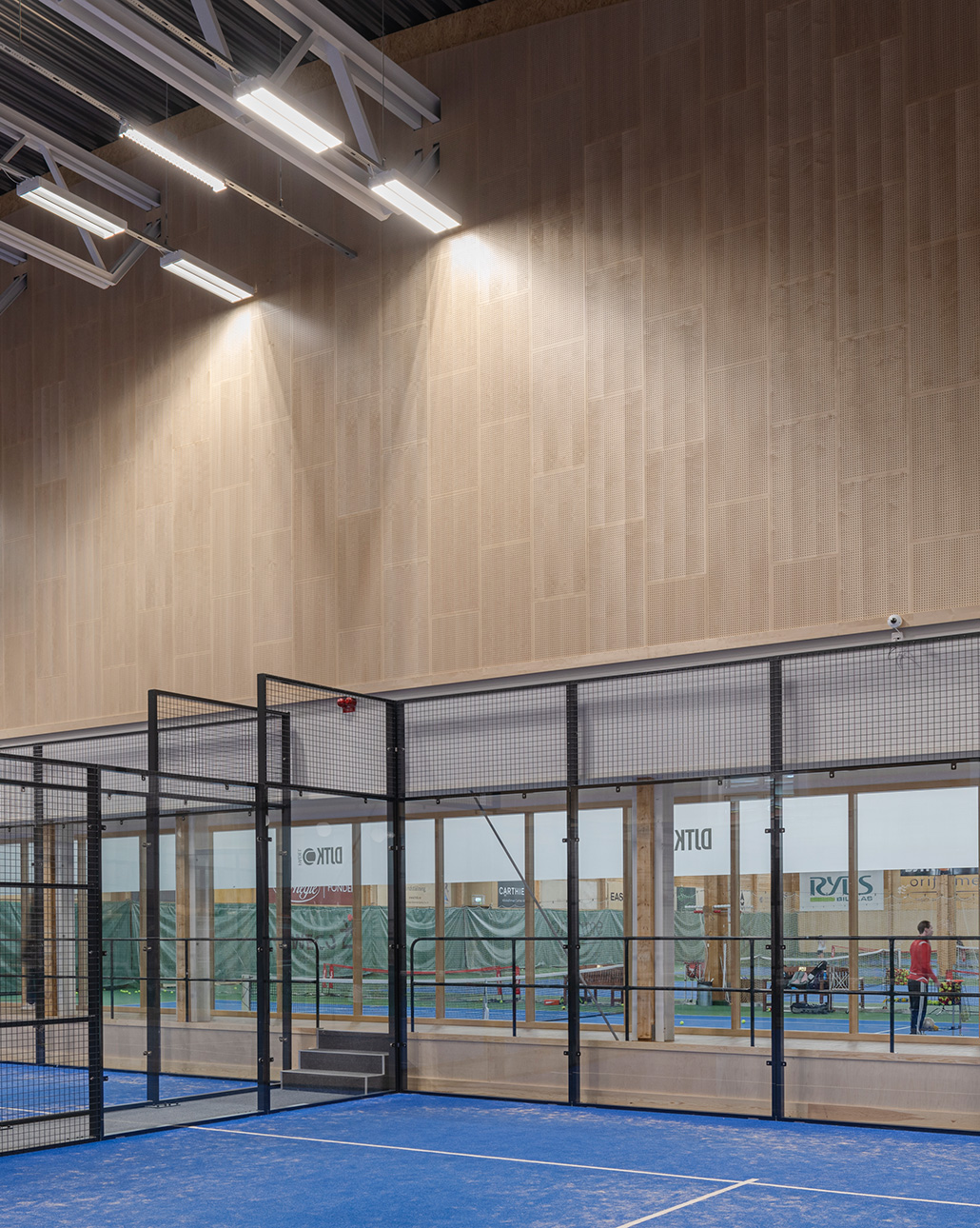 Acoustic panels in birch veneer clad padel hall | Gustafs Scandinavia