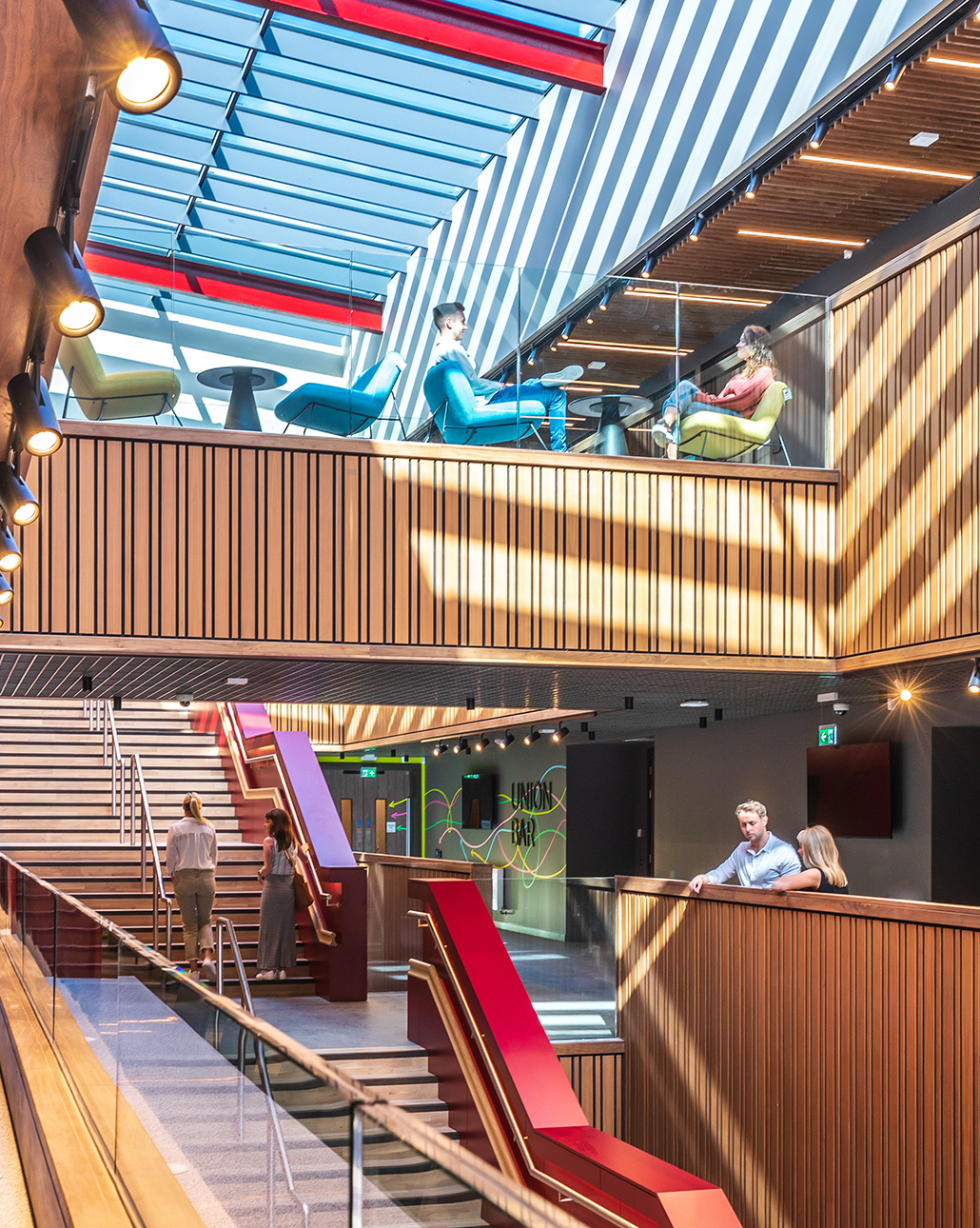 Walnut ribs and panels in university's student centre | Gustafs Scandinavia